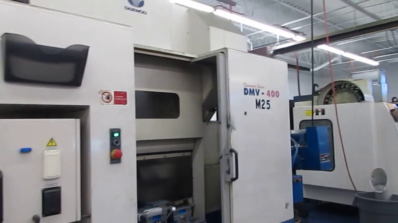 "Efficient Vertical Machining Center with Automatic Pallet Changer ...