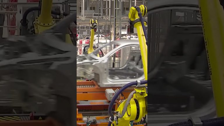 "Revolutionizing Automotive Production: Streamlined Robotic Assembly at ...
